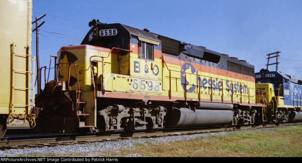 CSX 6598 X-B&O 4023 GP40 and CSX 6097 X-B&O 4198 GP40-2 are trailing units on a manifest ...